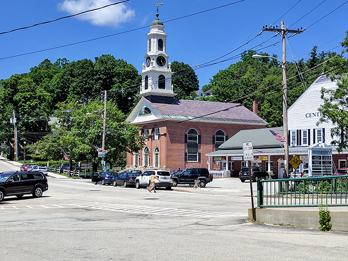 Classic New England church architecture anchors this peaceful town center, creating a timeless focal point for community life.