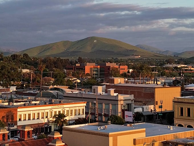 Mountain backdrops frame everyday life beautifully, reminding you that California scenery doesn't always require California prices.