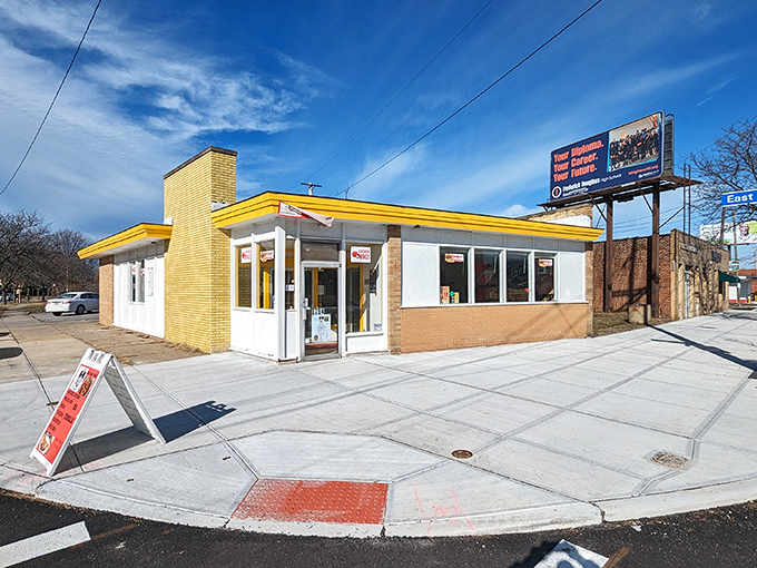 The cheerful yellow exterior of RoamingMeals promises sunshine on a plate. Even on cloudy Cleveland days, flavor forecast is bright!
