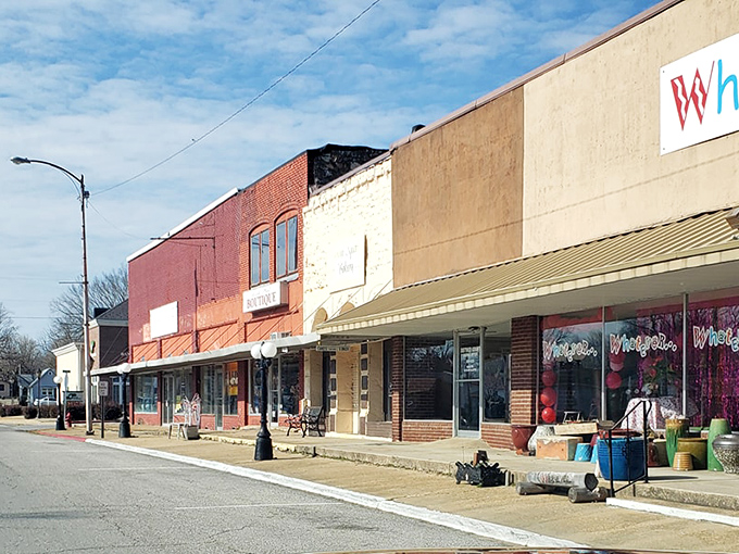 Classic small-town storefronts line Salem's main drag, promising affordable living and genuine community.
