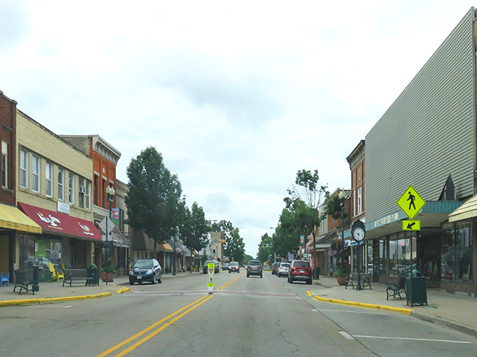 Tree-lined downtown streets create natural shade for leisurely walks between charming local shops and cafes.