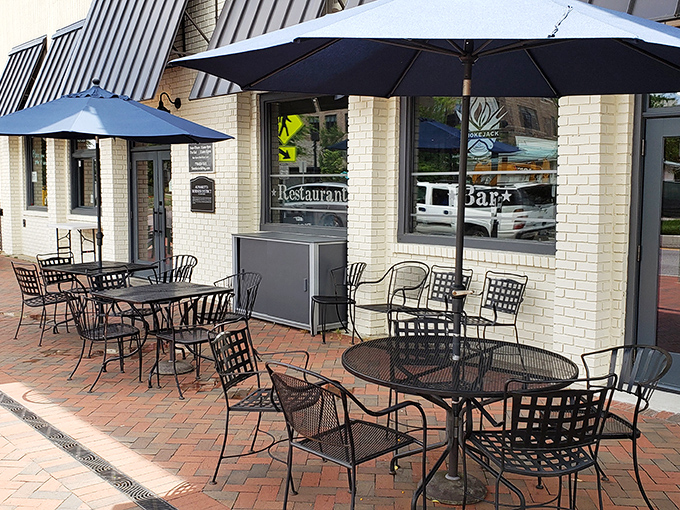 Brick buildings and outdoor seating create the perfect setting for enjoying championship-level barbecue in charming downtown Alpharetta.
