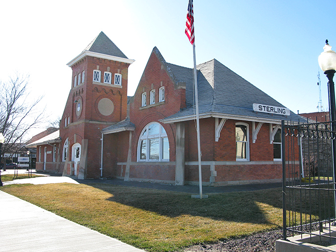 Wide streets accommodate both pickup trucks and pedestrians, where farming heritage meets retirement dreams.