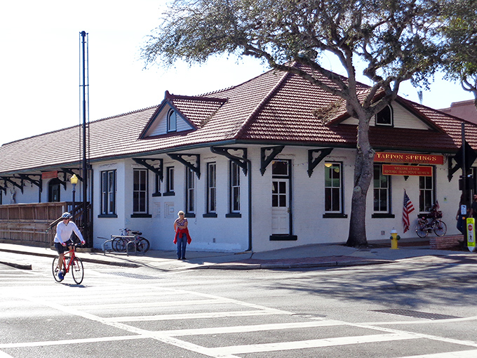 This Greek fisherman statue stands watch like a Mediterranean grandfather keeping an eye on his Florida grandkids.