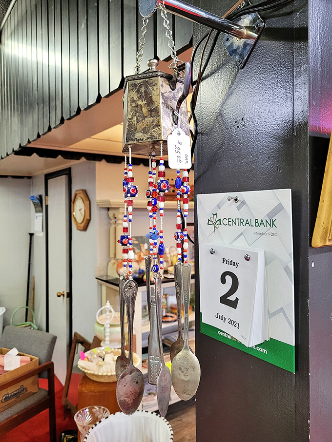 Vintage serving spoons hanging like wind chimes create the perfect soundtrack for serious treasure hunting adventures.