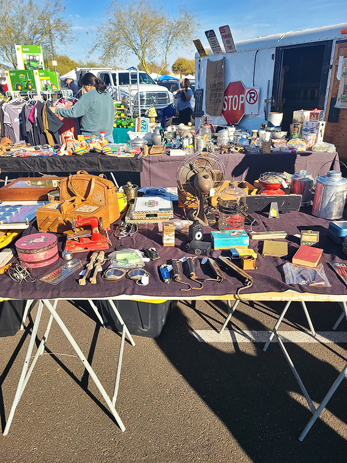 One person's castoffs become another's treasures. This table's fascinating jumble of vintage items promises discoveries for the patient browser.