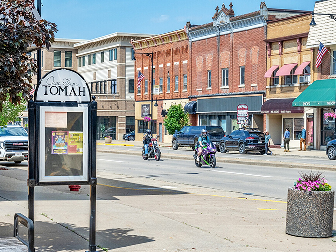 Tomah's downtown sign proudly welcomes visitors to a community where retirement means joining the fun, not watching from sidelines.