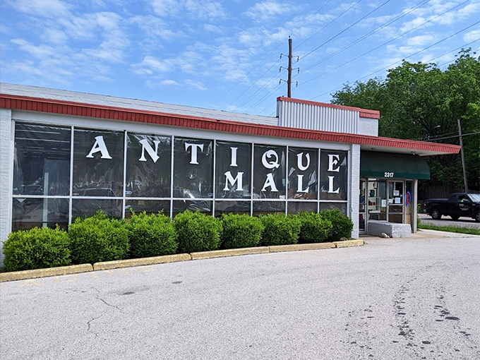 Treasure Isle's classic storefront with red trim is like the cover of a book filled with stories told through objects of the past.
