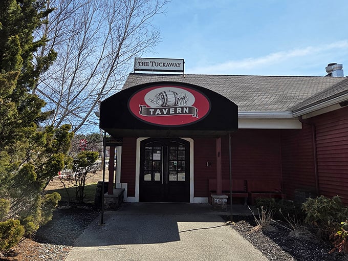 "The Tuckaway" sign above the door is like a secret handshake among New Hampshire's serious steak enthusiasts. Red building, red meat, perfect match!