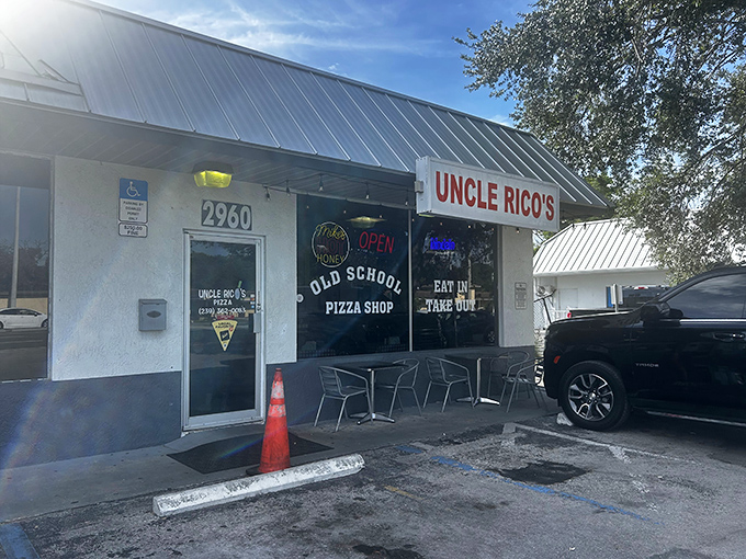 Classic pizza joint vibes where the neon's bright and the cheese stretches for miles. 