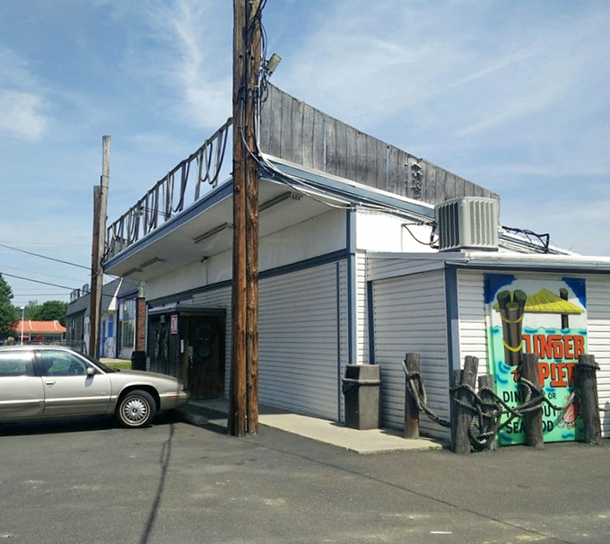 Simple buildings house complex flavors where every bite transports diners to distant shorelines.