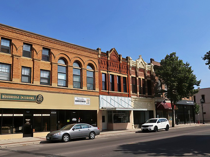 Historic buildings house modern businesses in this downtown that balances heritage with practical everyday living beautifully.