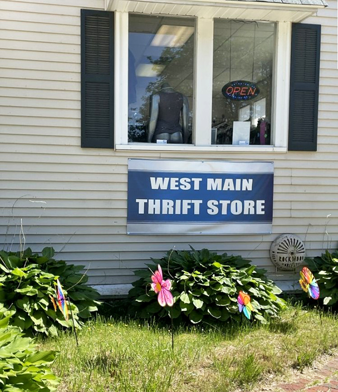The welcoming storefront of West Main Thrift, with its cheerful window display, promises a small-town thrifting experience with big-time finds.