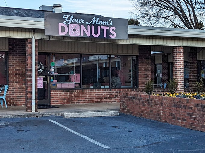 That pink donut sign with the clever name is like a welcome mat for your taste buds. Mom always did know best!