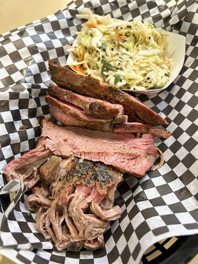 The barbecue sampler that ends all "I can't decide" debates. That coleslaw provides the perfect fresh counterpoint to smoky meat.