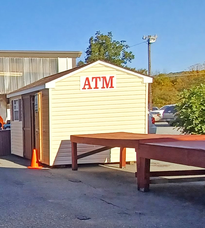Even treasure hunters need cash! The quaint ATM building stands ready to fuel your flea market adventures when you spot that must-have item.