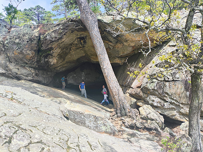 The cave entrance: where modern-day explorers can channel their inner outlaw without the inconvenience of actually breaking any laws.