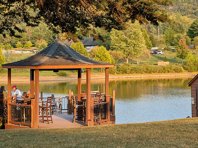 Sunset transforms the lakeside gazebo into the most coveted dining spot in Western Maryland. No reservation system could handle the waiting list for this view. 