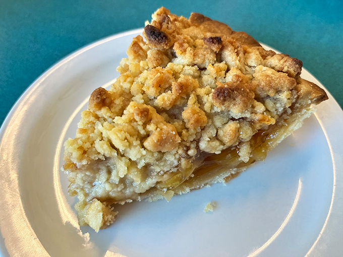 This isn't pie that's trying to reinvent dessert – it's pie that remembers what made us fall in love with pie in the first place: buttery crumble, tender fruit, and zero pretension.