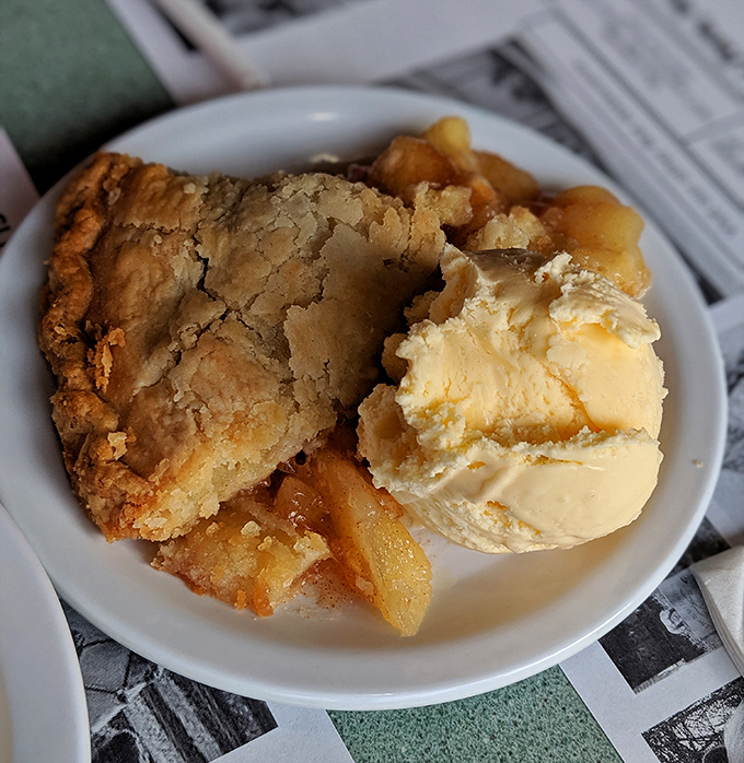 Apple pie à la mode proving that ice cream makes everything better, including already perfect pie.