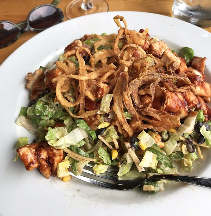 Crispy onion crowns turn this salad into a textural symphony that redefines healthy eating expectations.