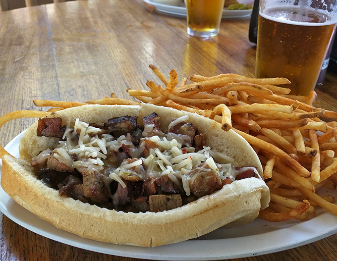 A sandwich that demands to be eaten with both hands and your full attention. Those fries aren't just a side&mdash;they're worthy companions. 