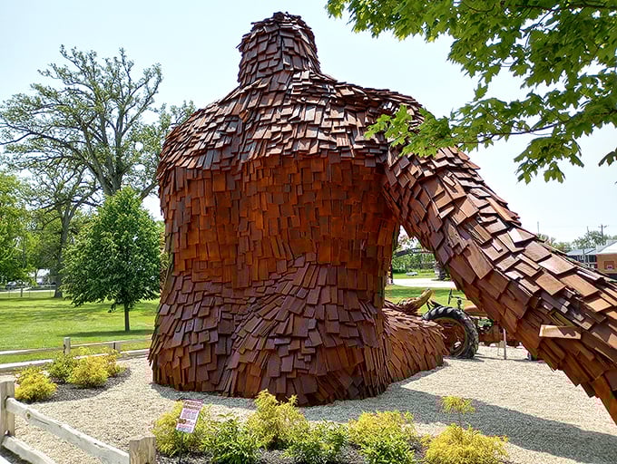 The back view reveals the incredible craftsmanship behind this wooden wonder. Over 5,000 boards of poplar went into creating this reclined cryptid.