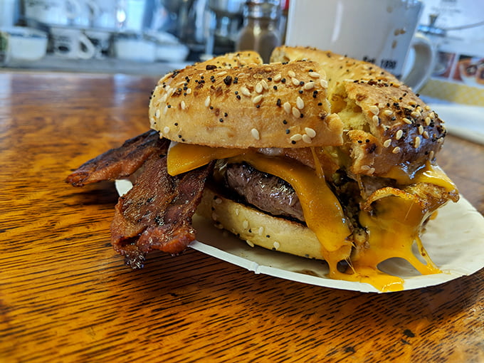 Breakfast meets burger in perfect harmony. This everything bagel creation with melty cheese and crispy bacon is worth getting out of bed for.