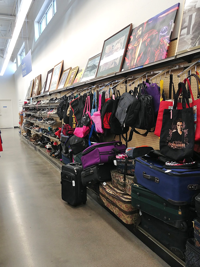 The luggage section &ndash; where your next adventure's companion awaits, alongside bags emblazoned with pop culture icons of yesteryear.