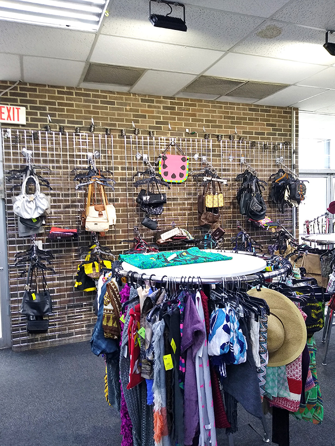Handbag heaven against exposed brick&mdash;architectural honesty meets fashion functionality. That watermelon-shaped purse is someone's future conversation starter.