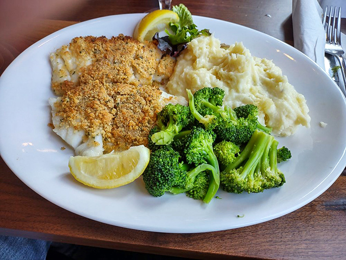Broiled scrod with that perfect golden crumb topping &ndash; proof that sometimes the simplest preparations let quality ingredients sing their own delicious song.