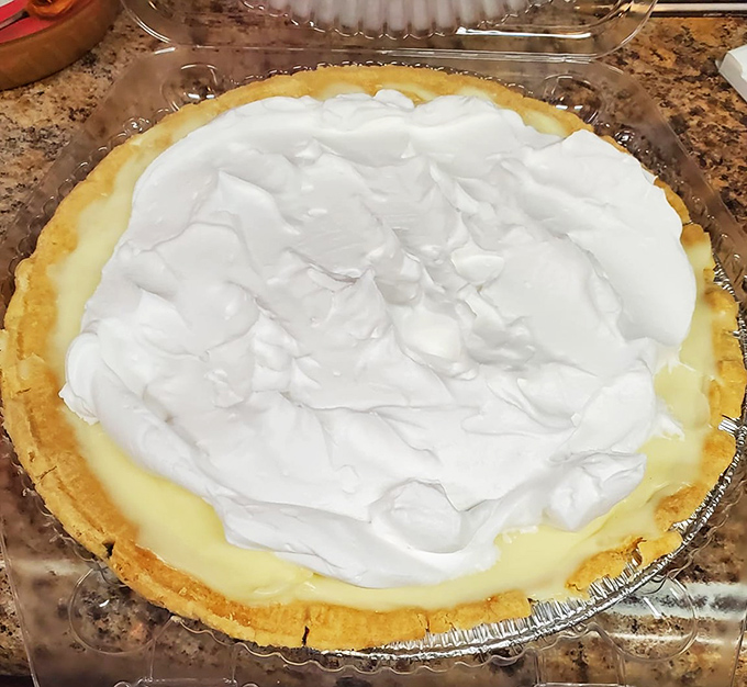 A banana cream pie with a cloud of whipped cream so perfect it belongs in the dessert hall of fame.
