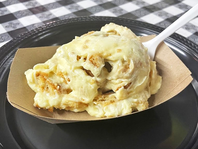 Banana pudding that makes you question why you've wasted time on lesser desserts. Creamy, vanilla-infused comfort in a paper boat of pure happiness.