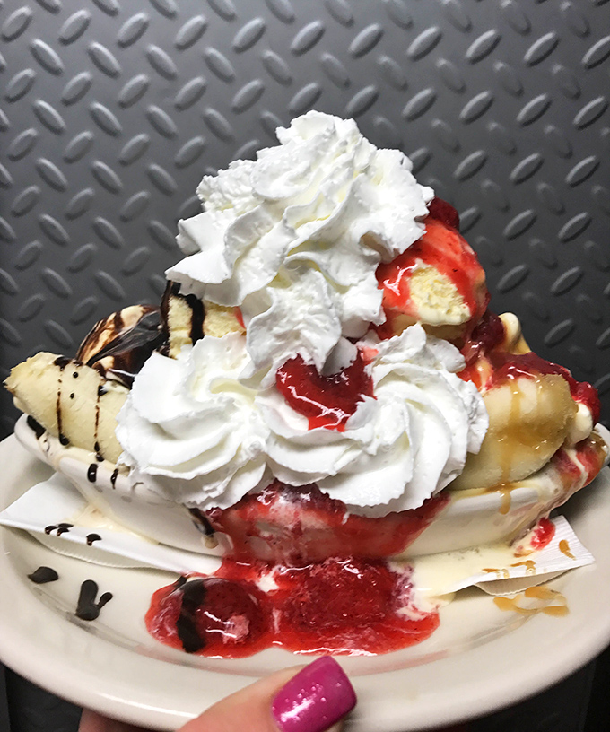 This isn't just dessert&mdash;it's a structural engineering marvel of whipped cream, strawberries, and ice cream that would make your dentist weep and your inner child rejoice.