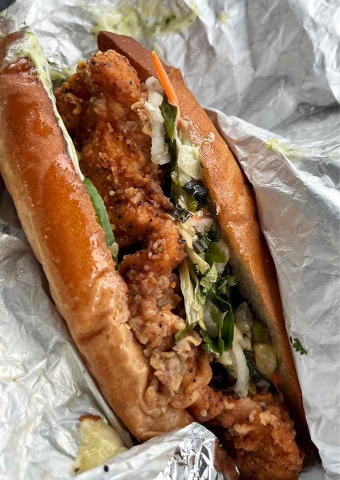 The Banh Mi sandwich&mdash;where crispy chicken meets fresh veggies in perfect harmony. Cultural fusion that makes your taste buds sing karaoke.