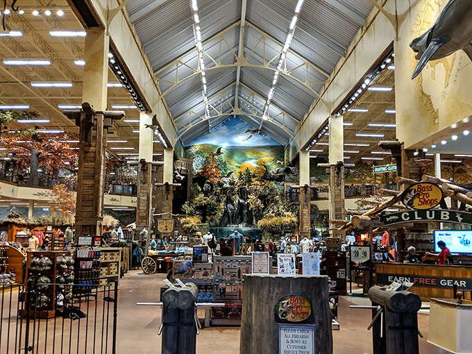 Bass Pro Shops brings the great outdoors inside. The dramatic ceiling and nature murals make shopping feel like an expedition.