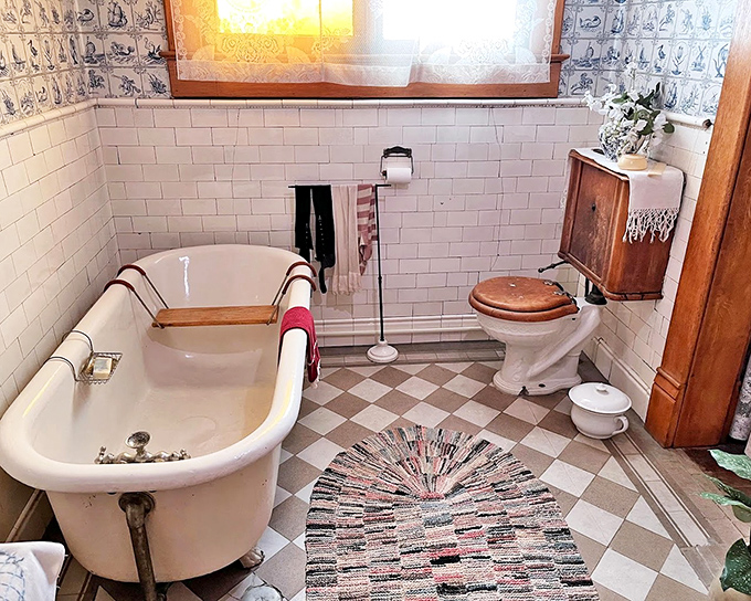 A bathroom that reminds us why Victorians weren't known for their speedy morning routines. That tub has witnessed more scrubbing and less scrolling than anything in your house.