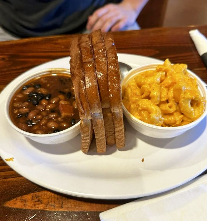 Beans that have clearly been introduced to smoke and mac & cheese that's unapologetically golden &ndash; comfort food's dynamic duo.