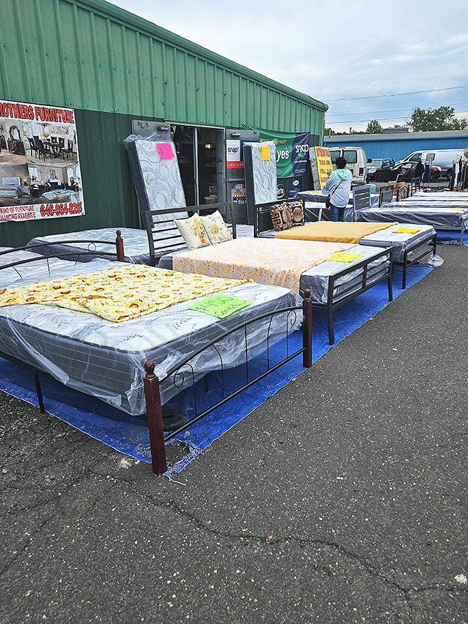 "Sleep on it" takes on literal meaning at this outdoor furniture display, where dreams of a better night's rest come with discount price tags.