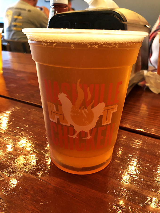 Nothing tames the Nashville heat quite like a cold beer, served in a cup that proudly announces its spicy allegiance.
