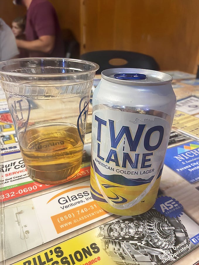 A cold beer in an unpretentious plastic cup &ndash; the perfect companion to seafood that needs no fancy stemware to elevate the experience.