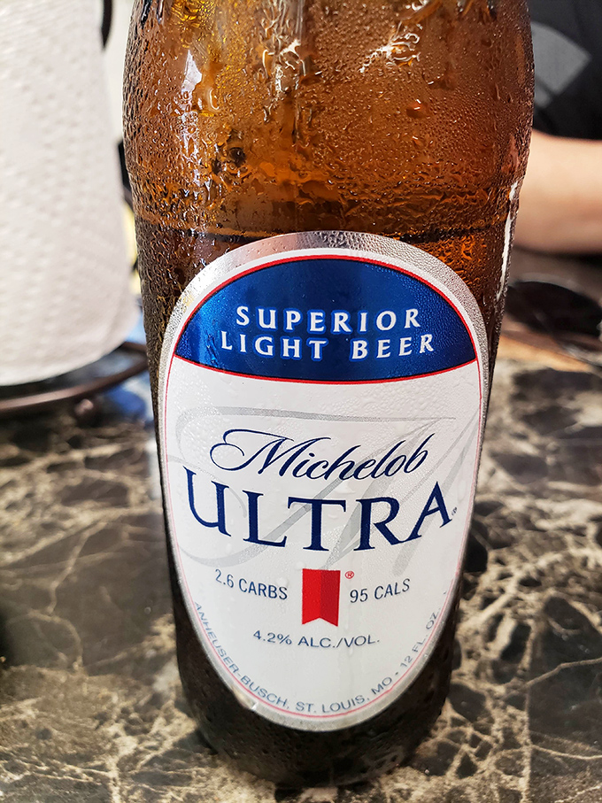 Because nothing complements slow-smoked meats quite like an ice-cold beer. The condensation on the bottle is practically begging you to take a sip.