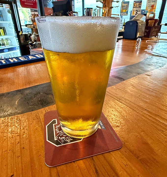 A perfectly poured beer with a foam crown fit for burger royalty&mdash;the ideal liquid companion for your meat masterpiece.