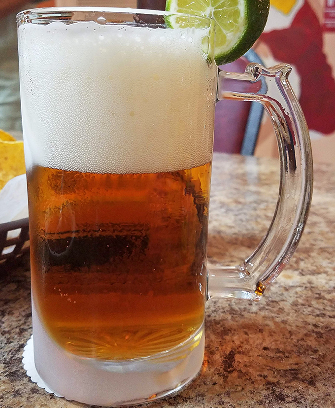 A frosty mug of cerveza with lime &ndash; because sometimes the perfect pairing for spicy Mexican food is simply cold, crisp beer. The condensation tells you it's ready.