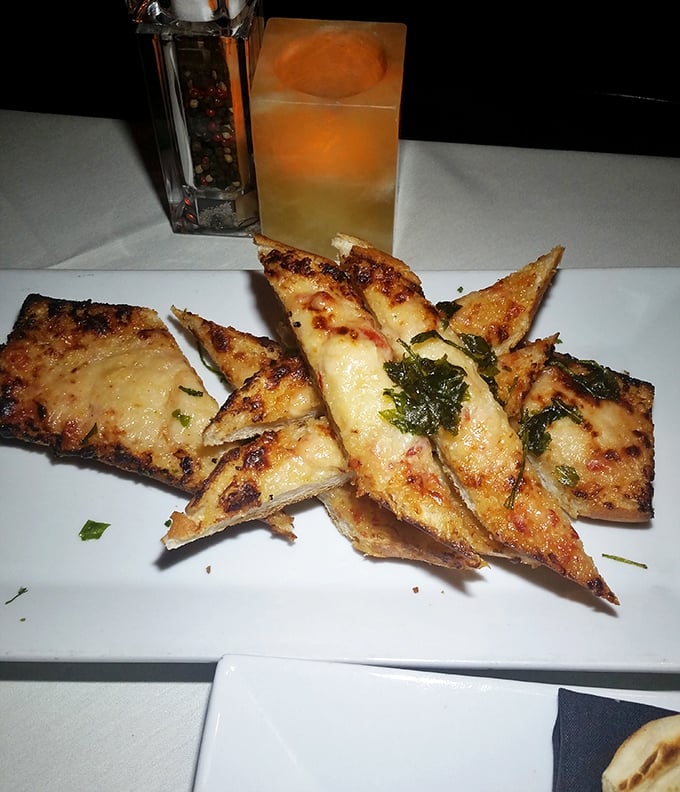 Crispy, cheesy, and utterly irresistible&mdash;this Belvie Bread isn't just a starter, it's the opening act that threatens to upstage the entire meal.