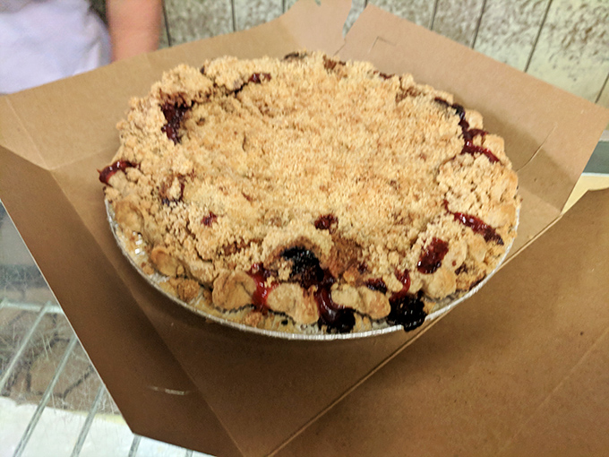 This berry pie isn't just dessert; it's summer captured in a buttery crust, waiting to transport you to simpler times with each bite.