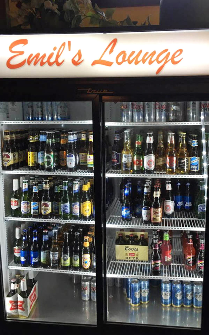 The beer cooler at Emil's offers a democratic selection&mdash;from craft options to reliable classics, all equally welcome at this unpretentious establishment.
