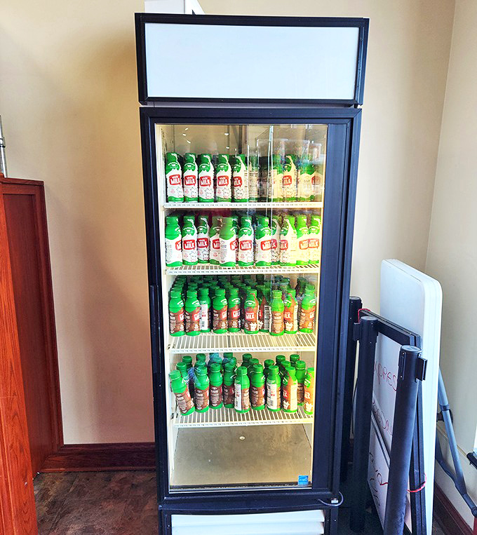 Even the beverage cooler has standout appeal – because what's a perfect donut without the perfect drink pairing? Hydration matters when indulging.