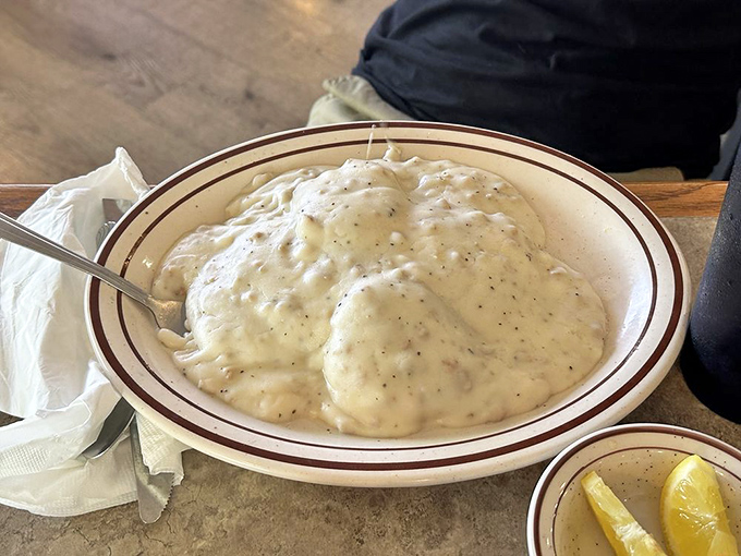 Biscuits and gravy so good they'd make your grandmother both proud and jealous. That pepper-speckled gravy is practically drinkable.