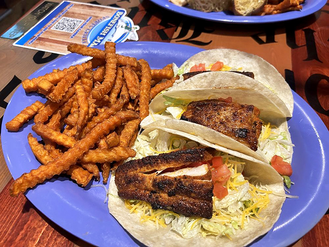 Blackened fish tacos that bring the heat and the sweet. Fresh cabbage, cheese, and perfectly seasoned fish create a handheld flavor fiesta.